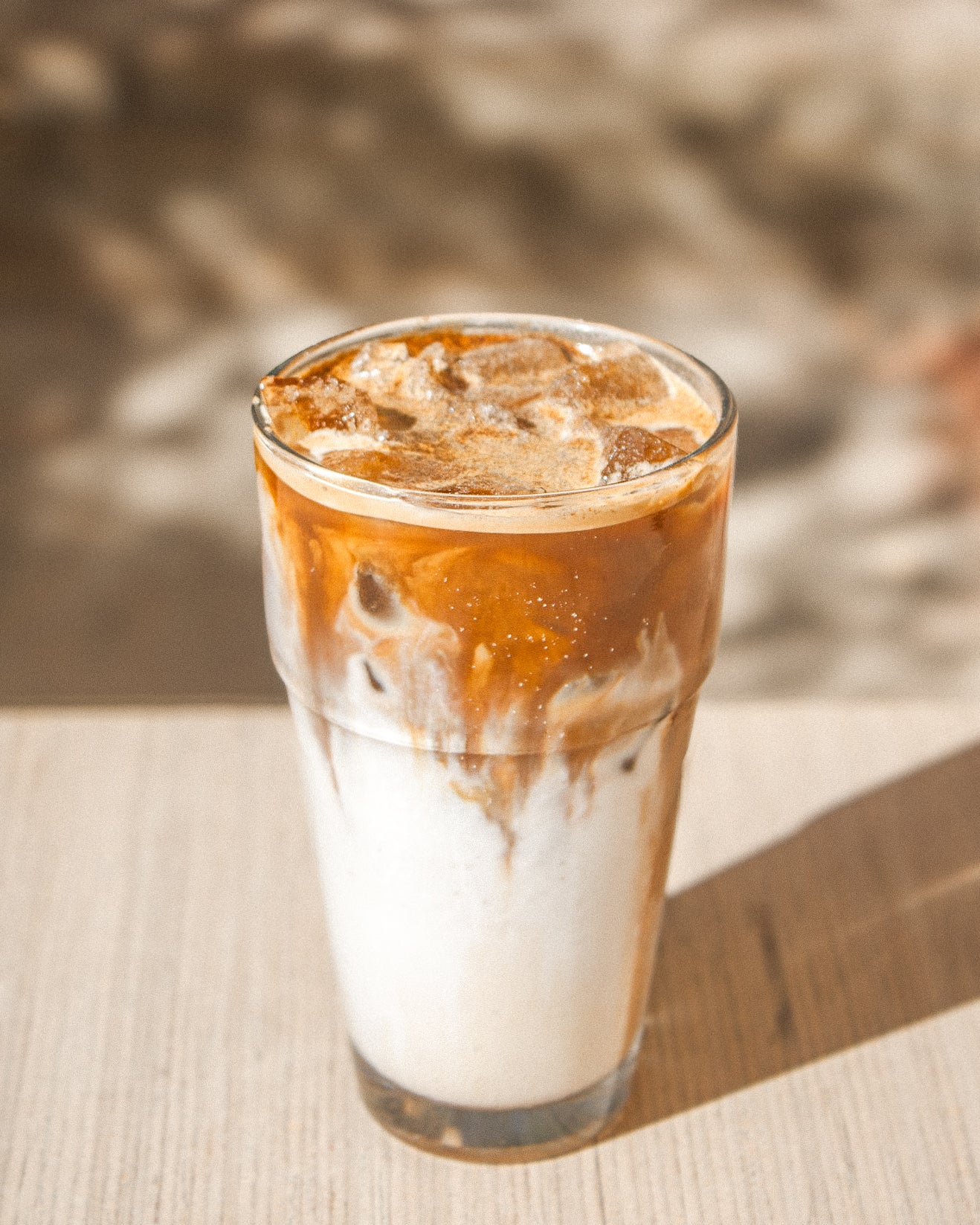 Iced Cardamom & Brown Sugar Latte - 16 oz | Land and Water Coffee